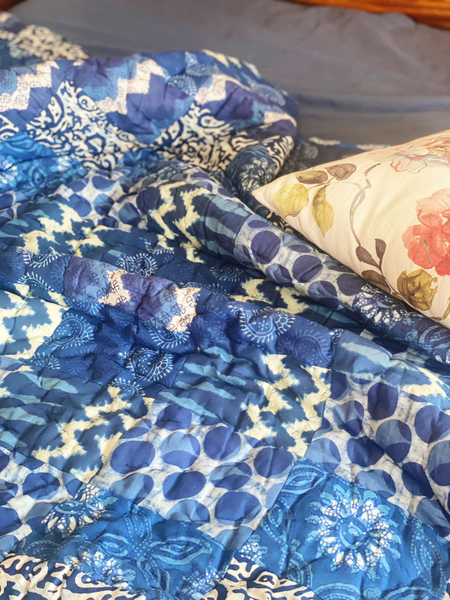 Single patchwork reversible quilt