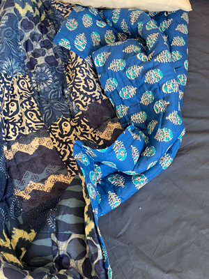 Single patchwork reversible quilt