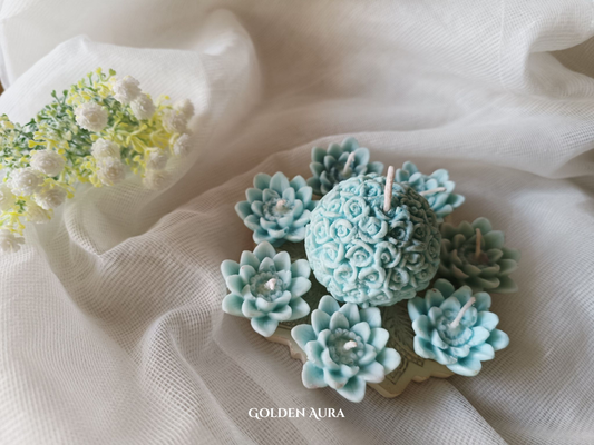Rose Ball Candle With Floating Candles And A Coaster