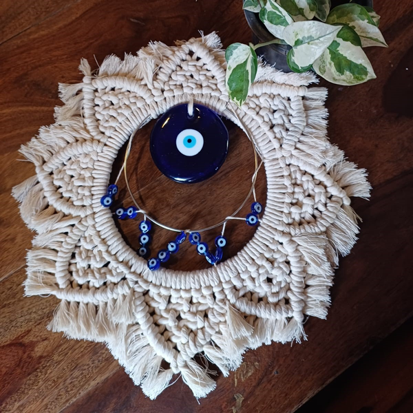 White macrame evil eye wall hanging